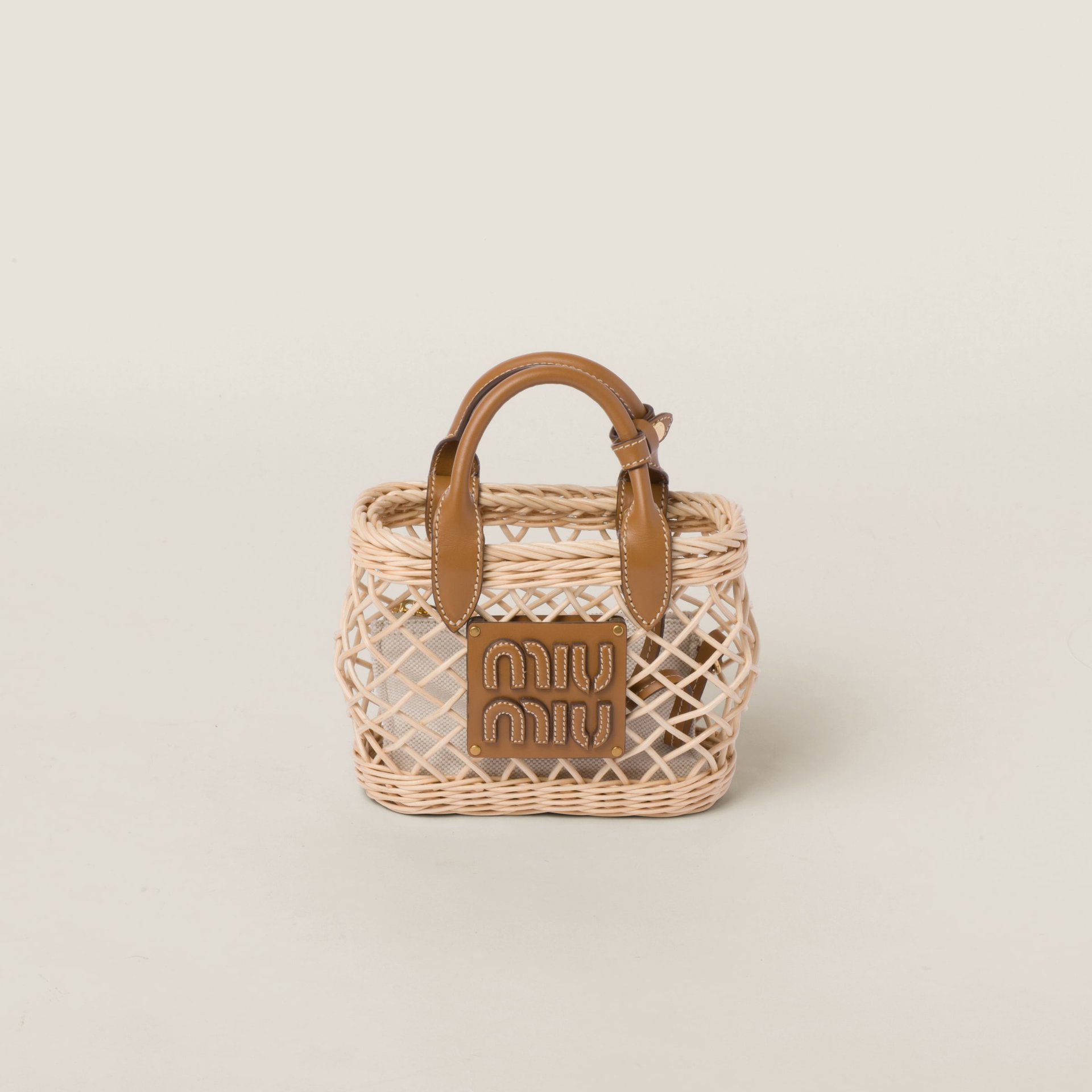 Woven fabric handbag with leather trim | Everuts